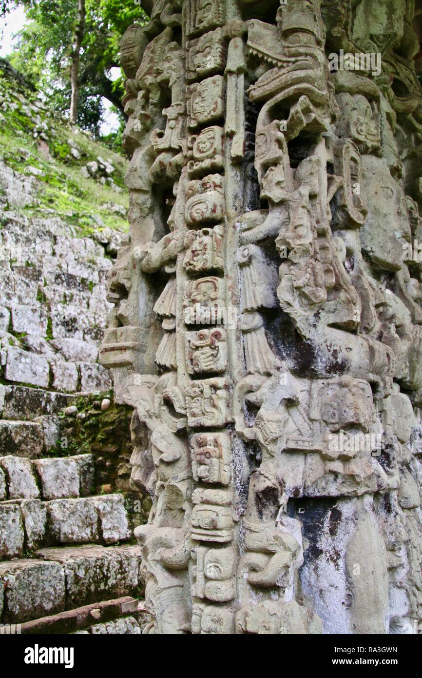 Carved stone pillar in Mayan ruins in the jungles of Honduras Stock ...