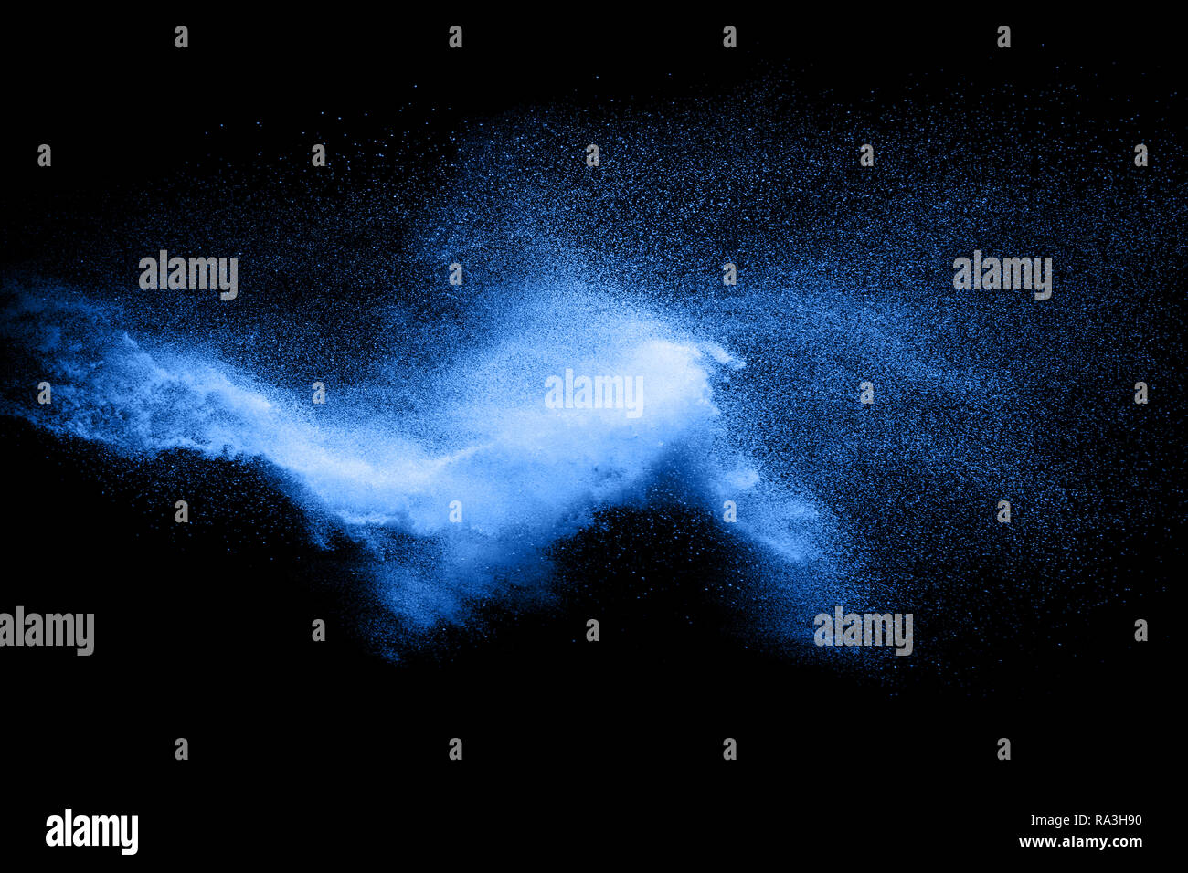 Blue powder explode cloud on black background. Launched blue dust ...