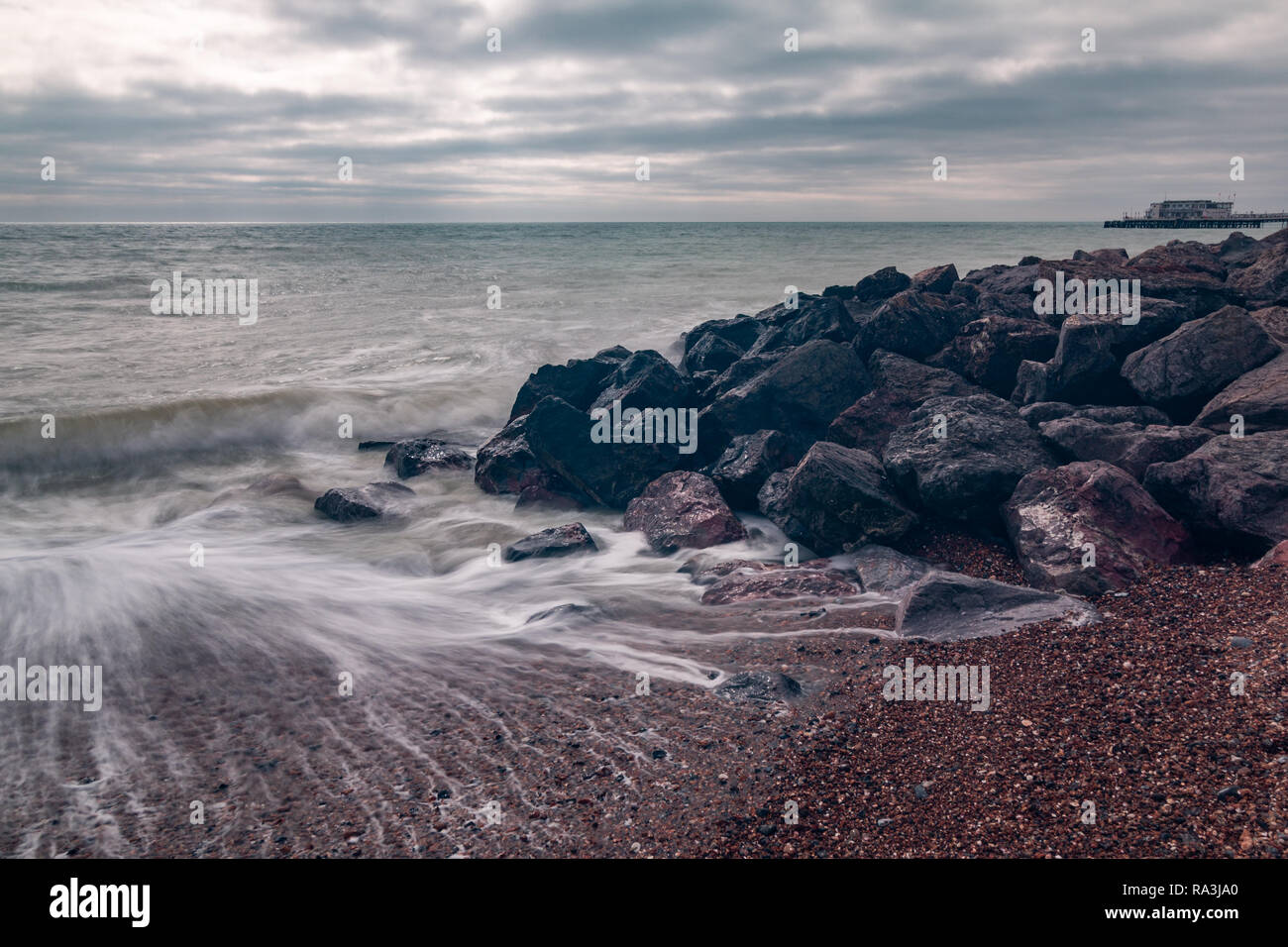 Worthing beach captured using a slow shutter speed so that the sea ...