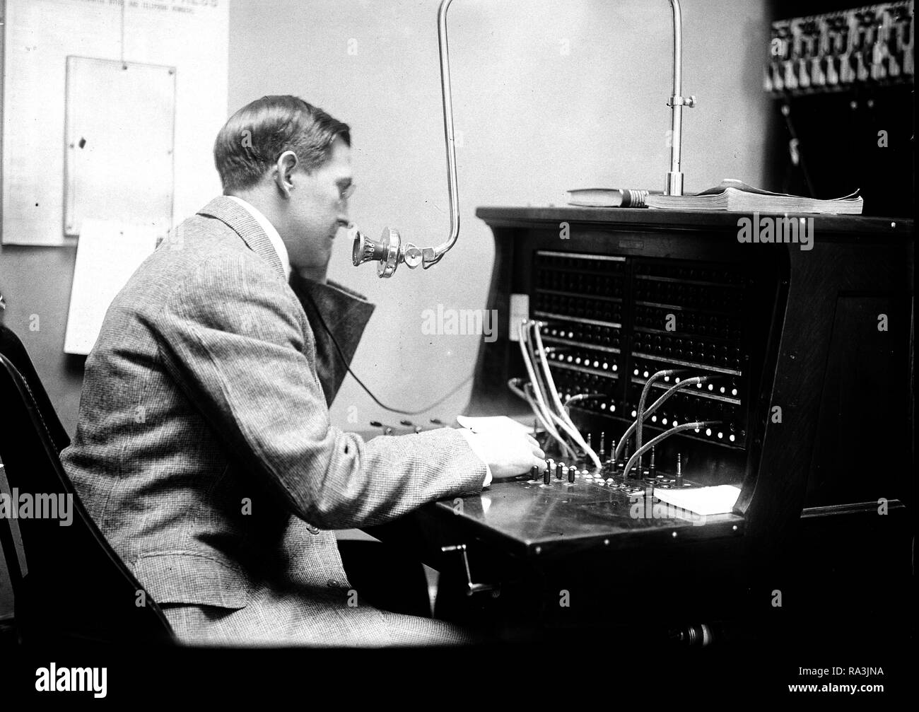 Man working telephone exchange in House of Represenatives office ...
