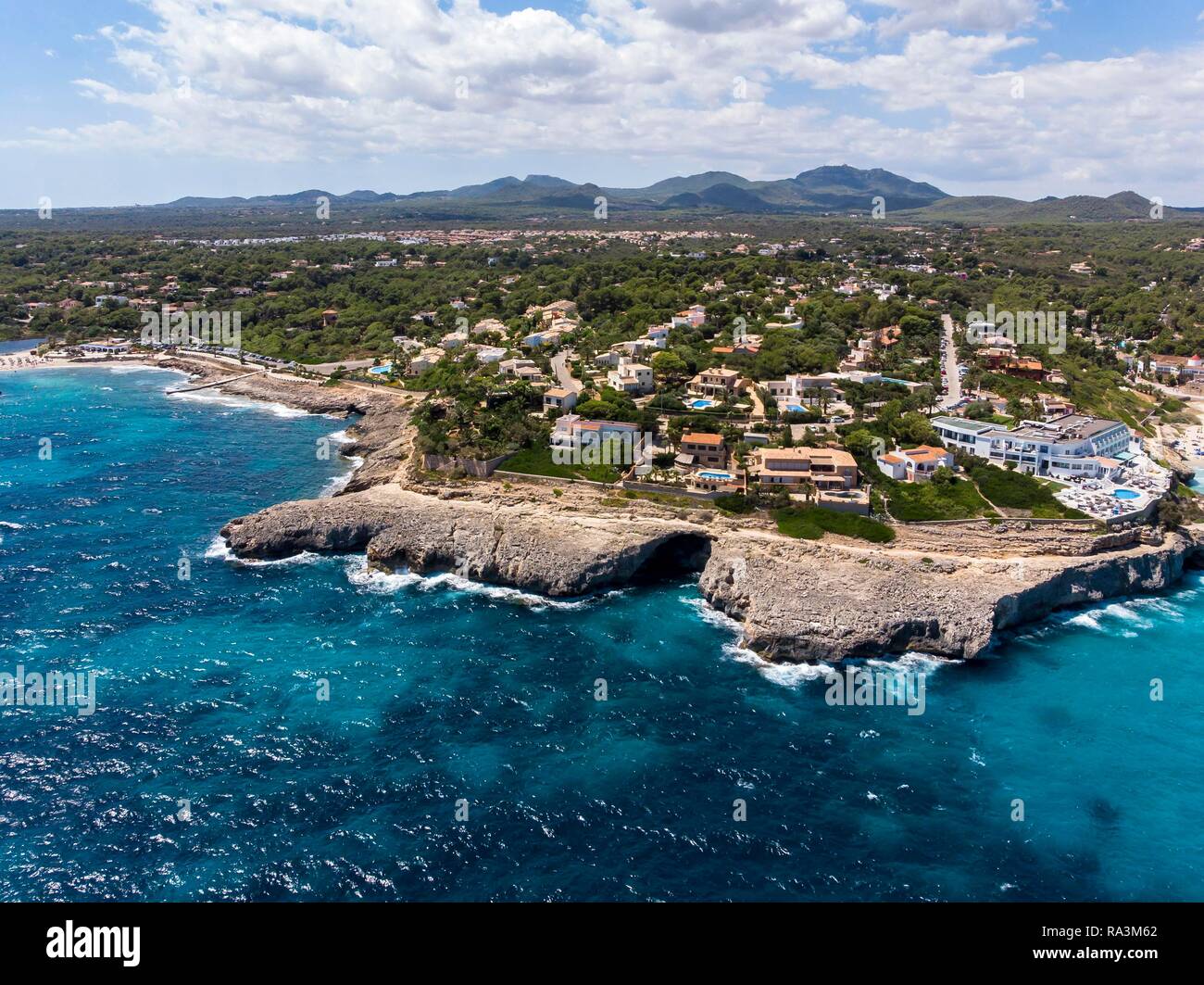 Drone shot, Rocky Coast with Villas and Hotels, Cala Tropicana and Cala ...