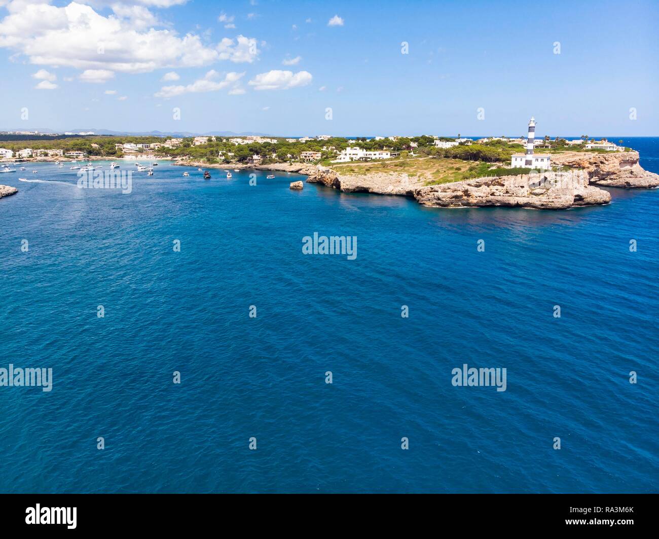 Aerial view, Bay of Portocolom and Cala Parbacana, lighthouse, Punta de ...