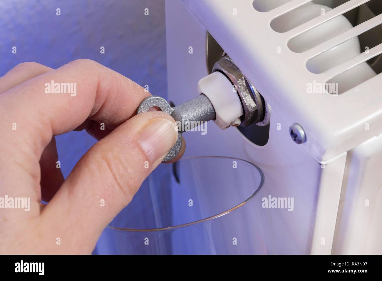 Hand venting a radiator with a special key, Bavaria, Germany Stock ...