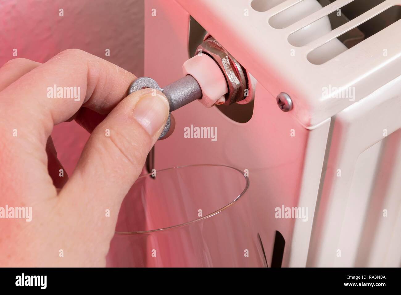 Hand venting a radiator with a special key, Bavaria, Germany Stock ...