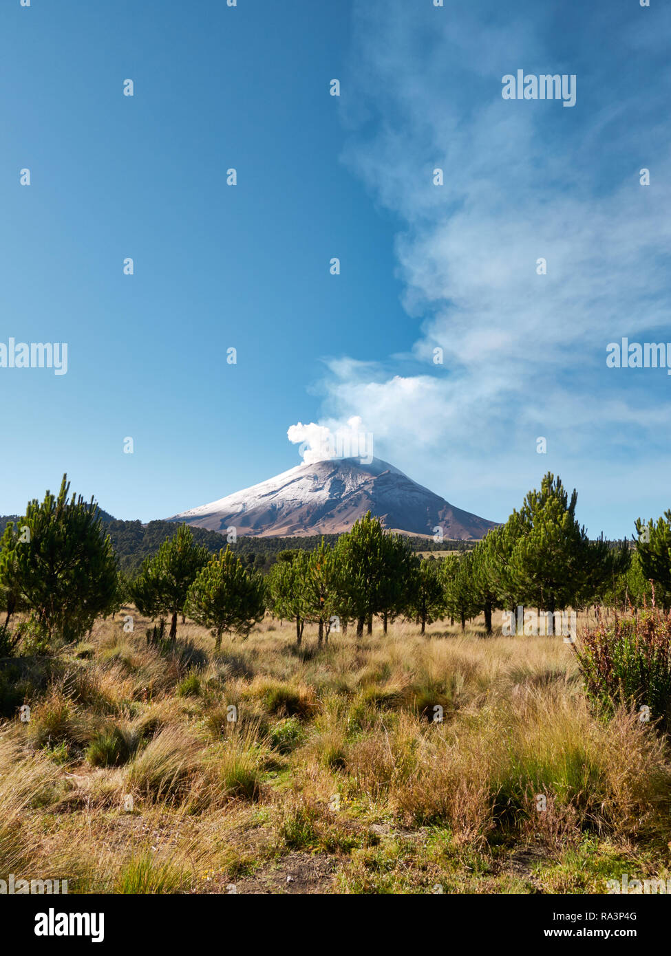 Smoke comes out from the Popocatepetl volcano seen from Itza-Popo ...