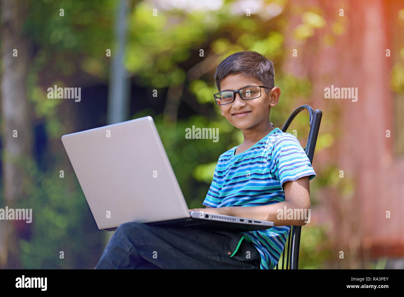 Portrait smart boy working laptop hi-res stock photography and images ...