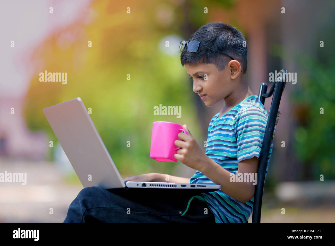 Computer laptop notebook indian child hi-res stock photography and ...