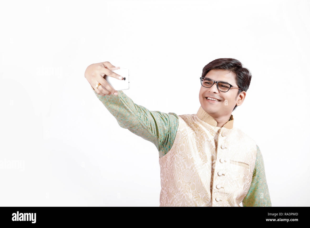 Photo of young indian man hi-res stock photography and images - Alamy