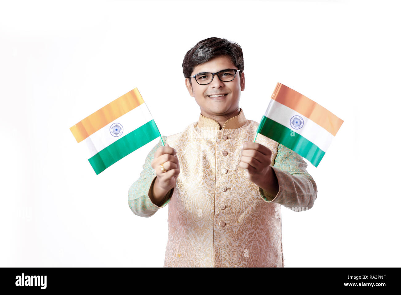 young Indian man holding Indian flag Stock Photo - Alamy