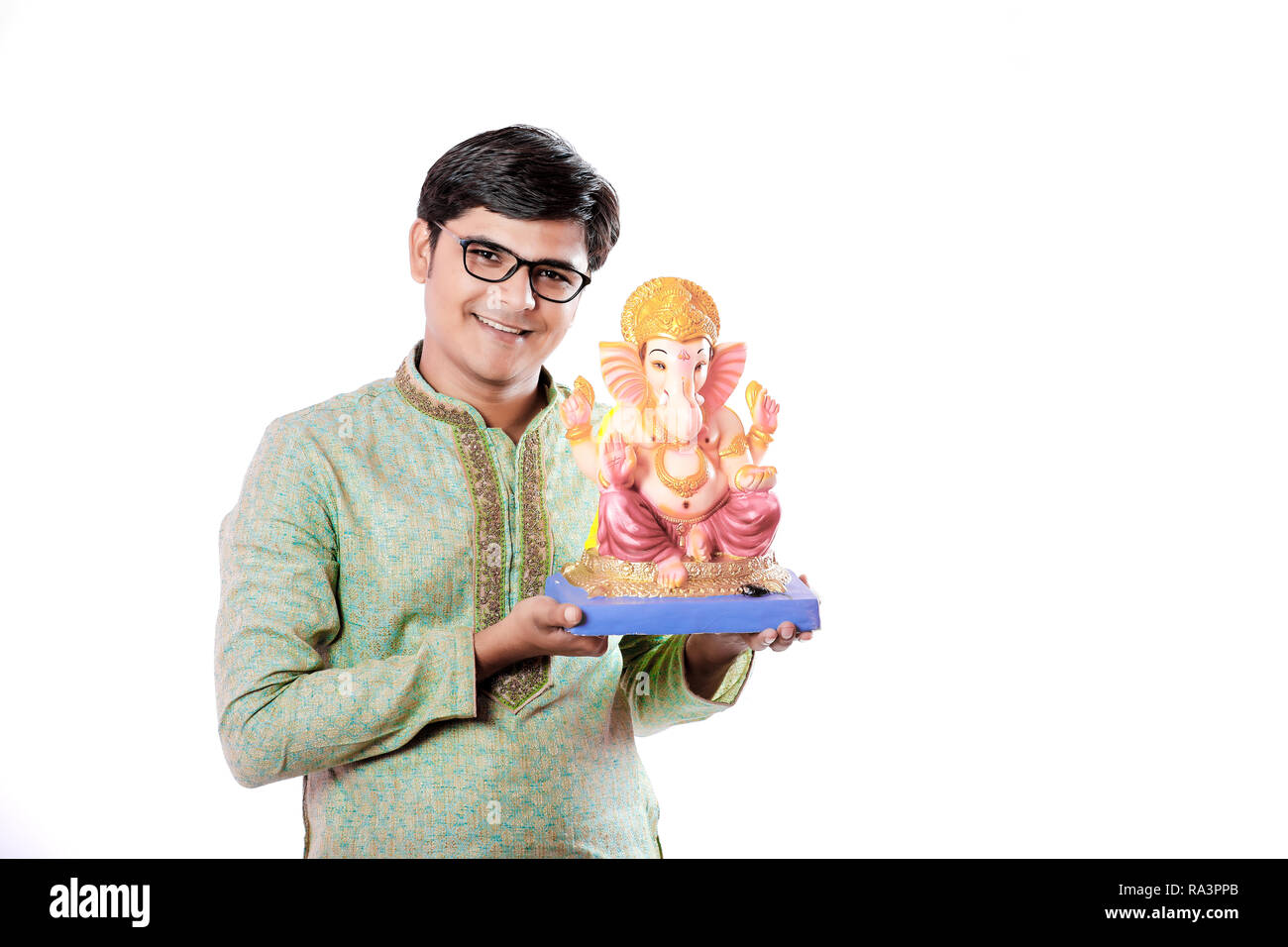 Young Indian man with Lord Ganesha , Celebrating Ganesh festival Stock ...