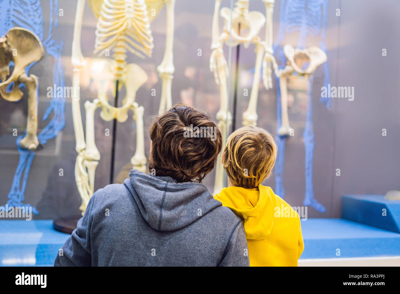 Beijing, China, October 16, 2018: Dad and son are watching the ...