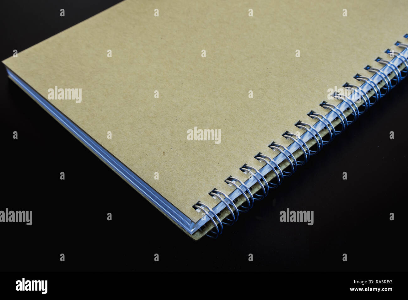 Blank cover of Note Book on Black background Stock Photo - Alamy