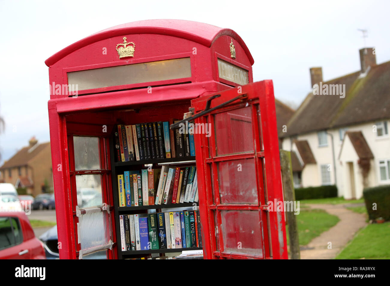General view of an old telephone box being used as a book exchange in ...