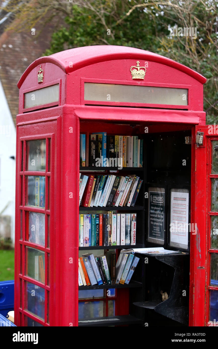 General view of an old telephone box being used as a book exchange in ...
