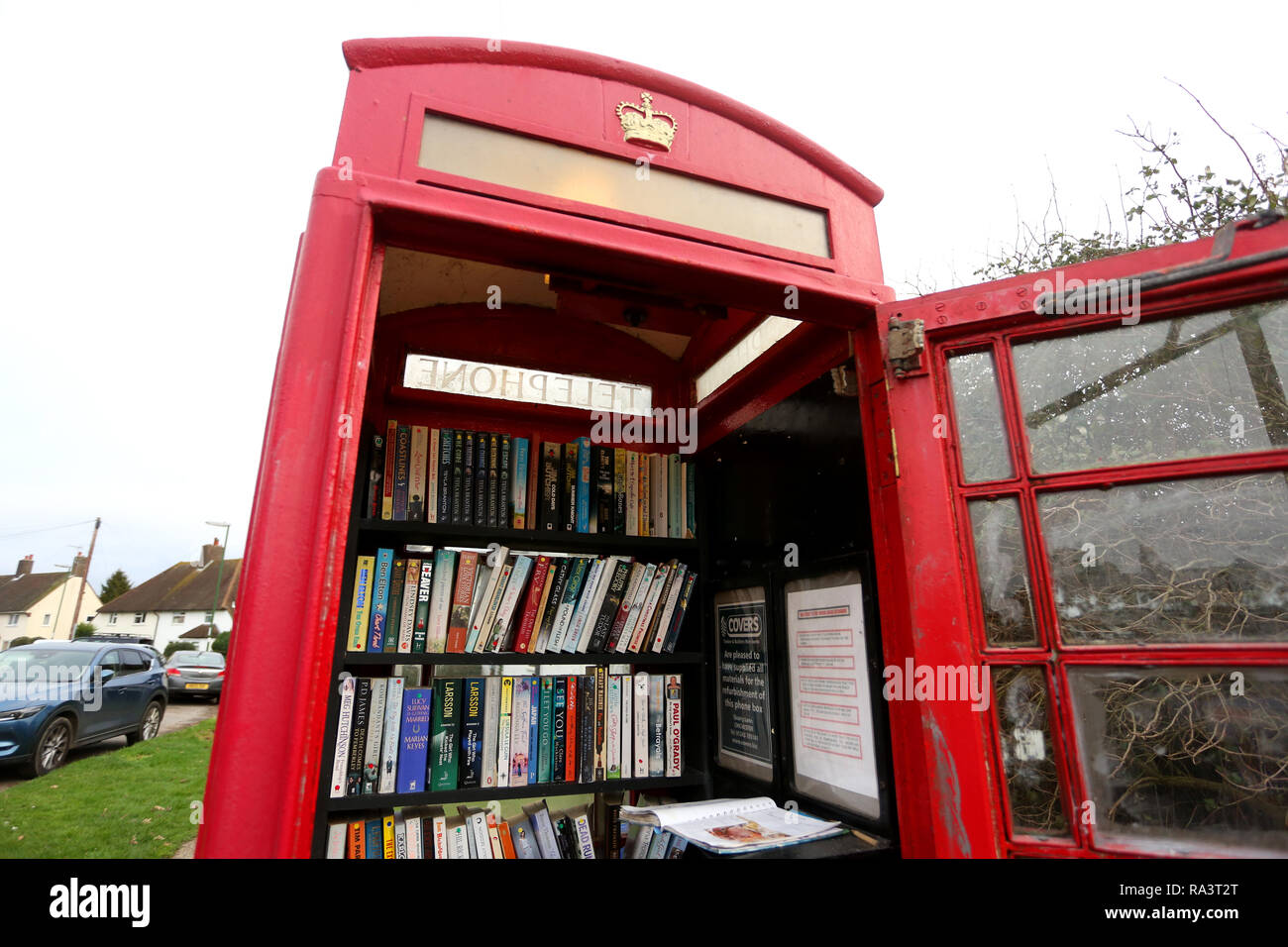 General view of an old telephone box being used as a book exchange in ...