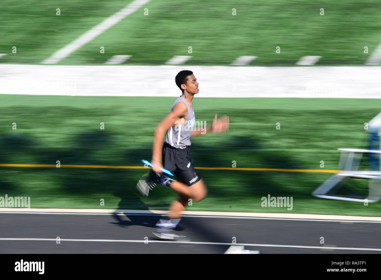Sprinter in motion Stock Photo - Alamy
