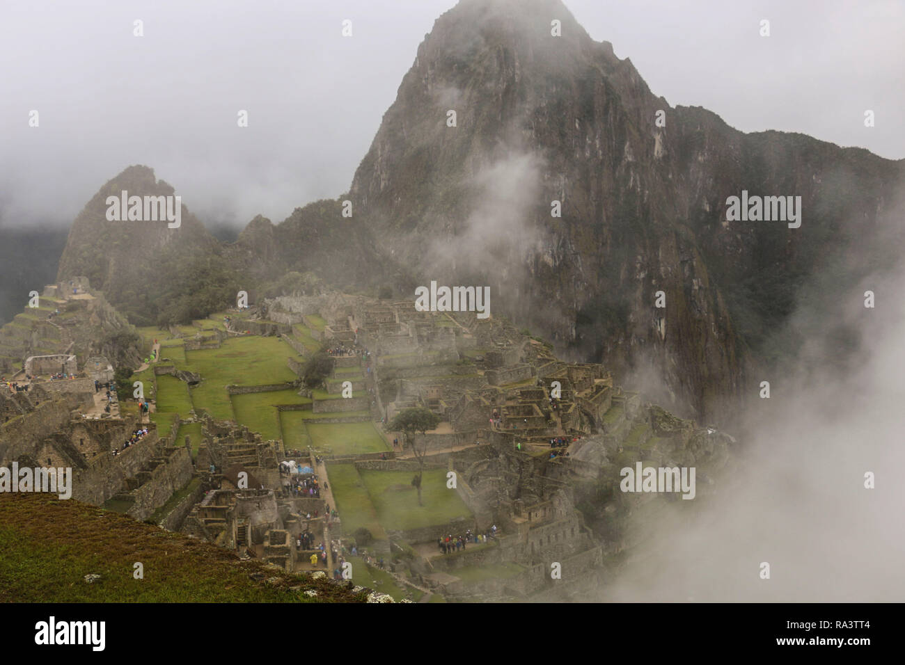 Strong fog on Machu Picchu, Peru Stock Photo - Alamy