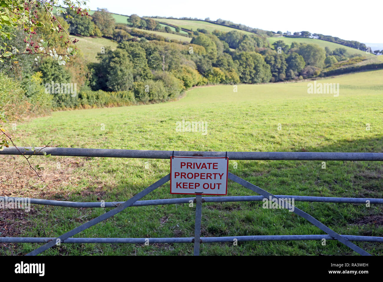 Private property sign on farm gate Stock Photo - Alamy