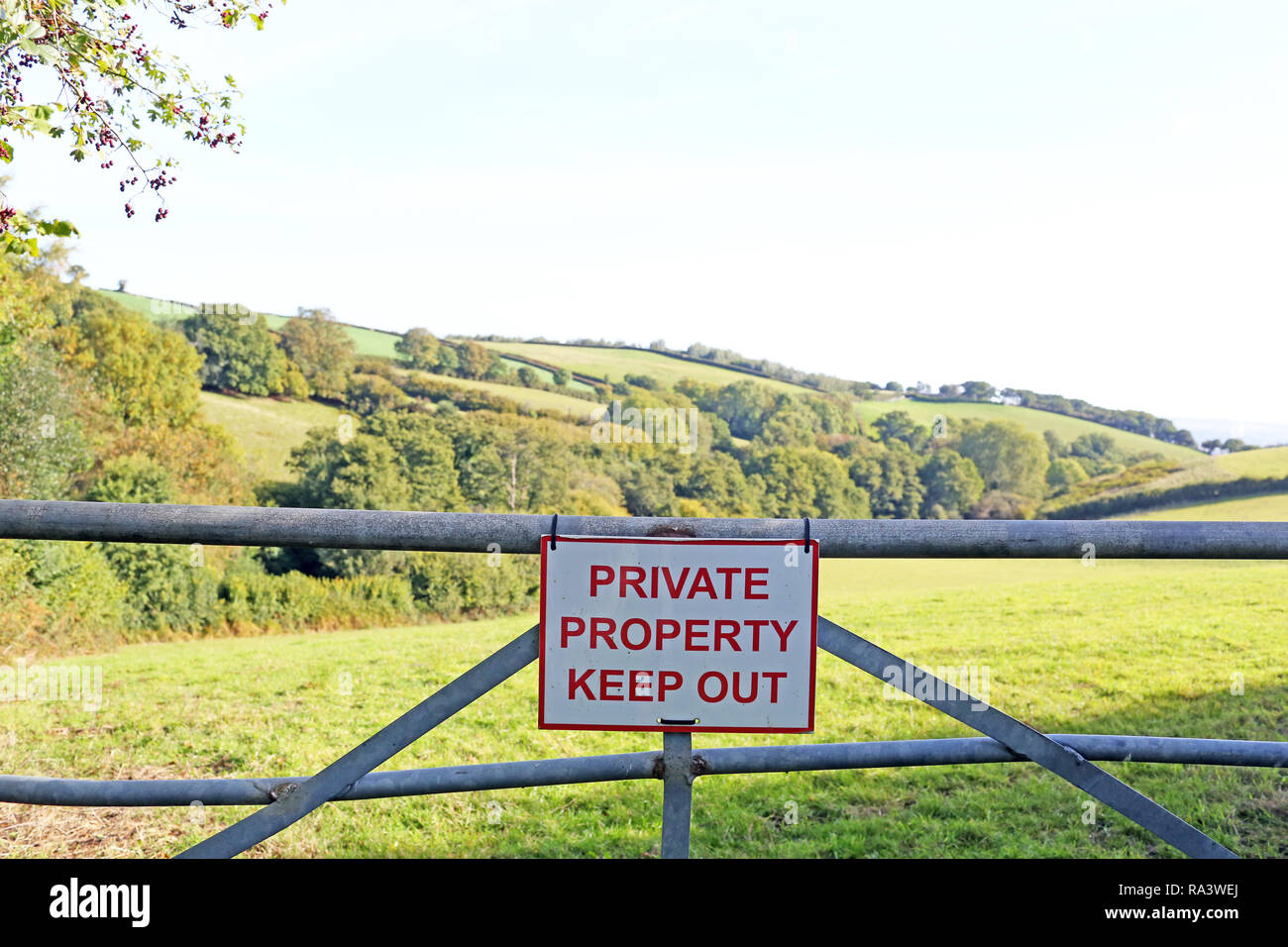 Private property sign on farm gate Stock Photo - Alamy