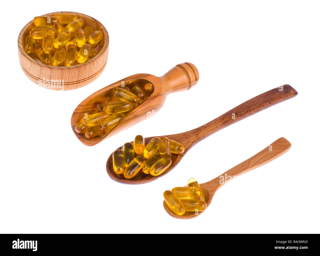 Yellow vitamin soft gelatin capsules with oily drug and nutritional ...