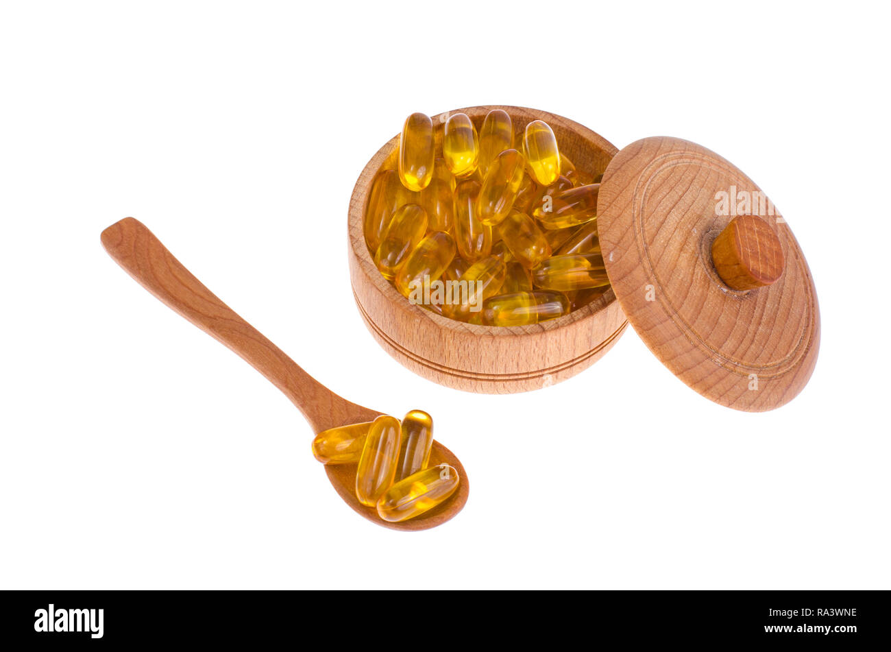 Yellow vitamin soft gelatin capsules with oily drug and nutritional ...