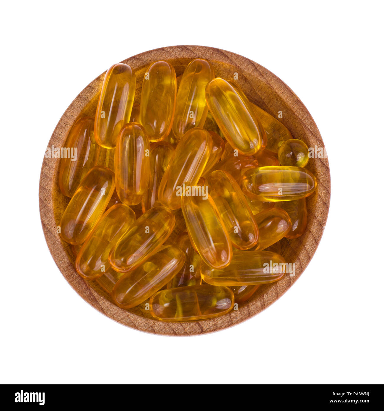 Yellow vitamin soft gelatin capsules with oily drug and nutritional ...