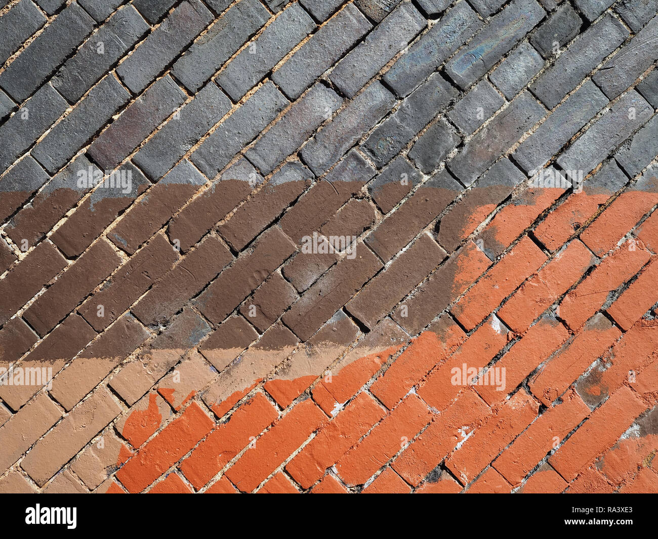 Diagonal brick wall, blue brown and orange paint Stock Photo - Alamy