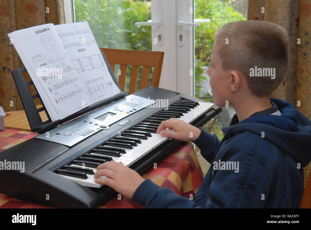 Child keyboard hi-res stock photography and images - Alamy