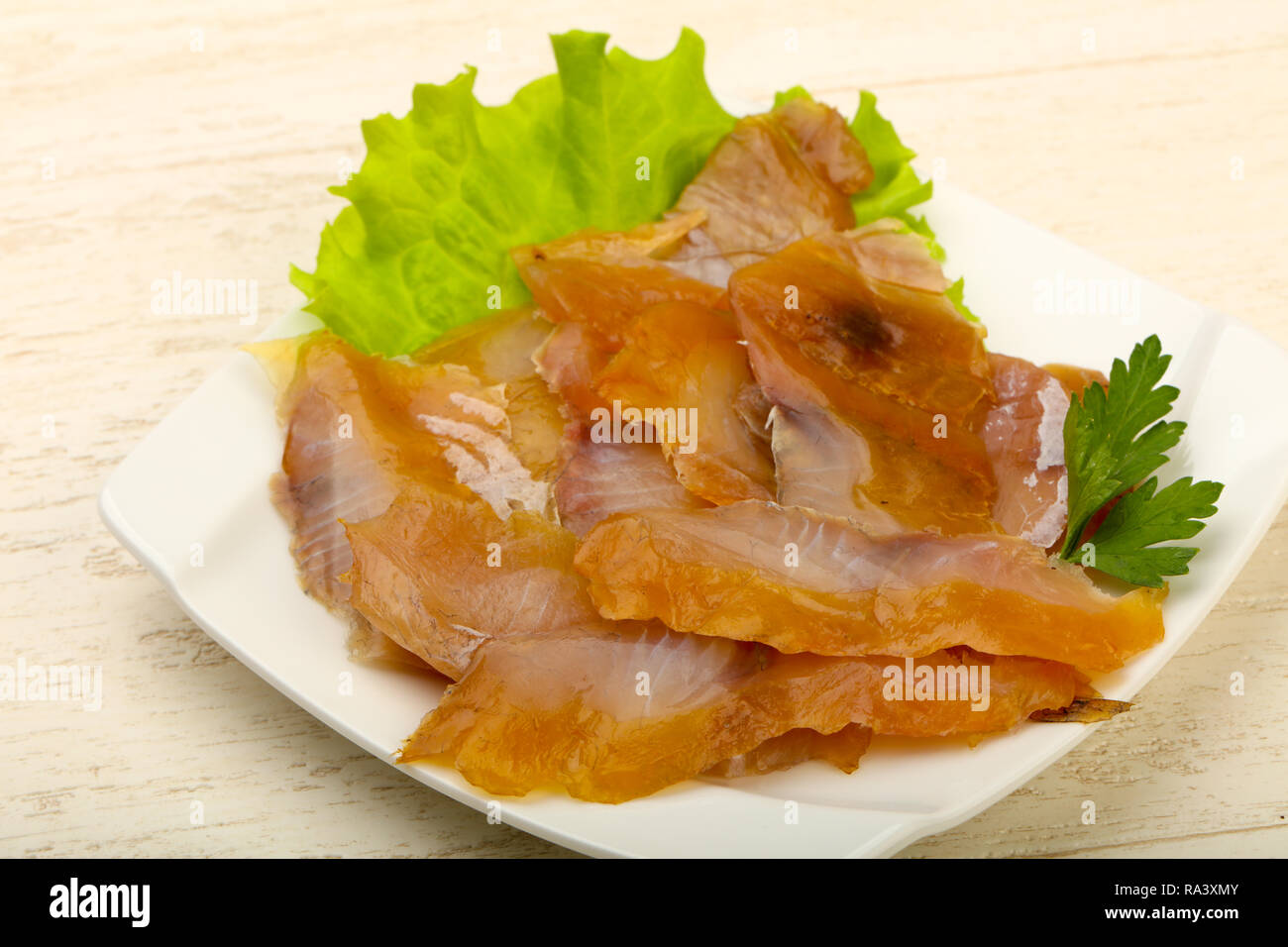Smoked catfish fillet carpaccio Stock Photo - Alamy