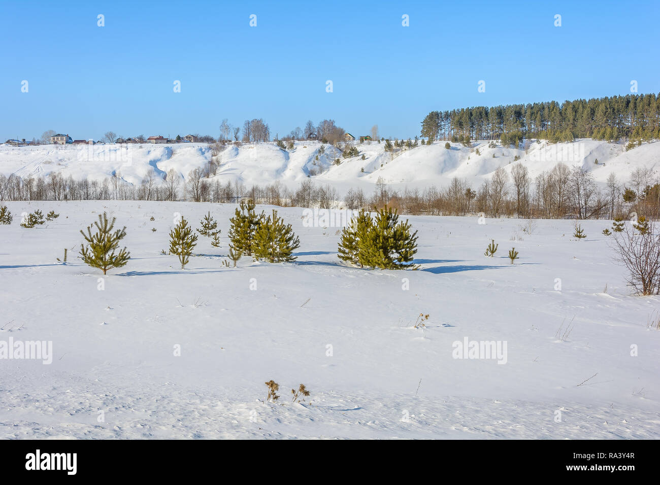 The snowy hills around the fields and forests in winter Stock Photo - Alamy