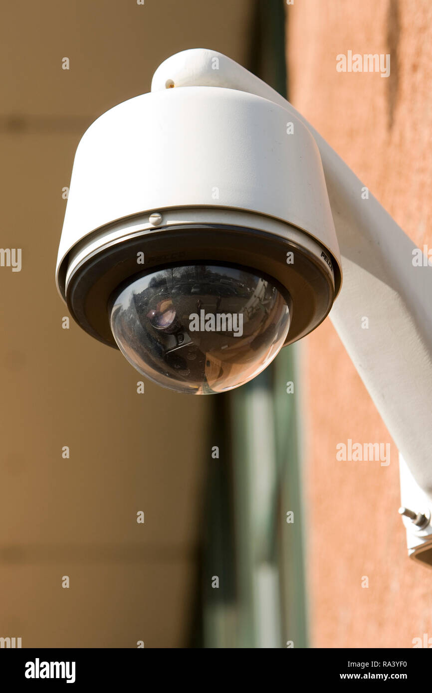Wall mounted domed CCTV pan and tilt surveillance security camera Stock ...