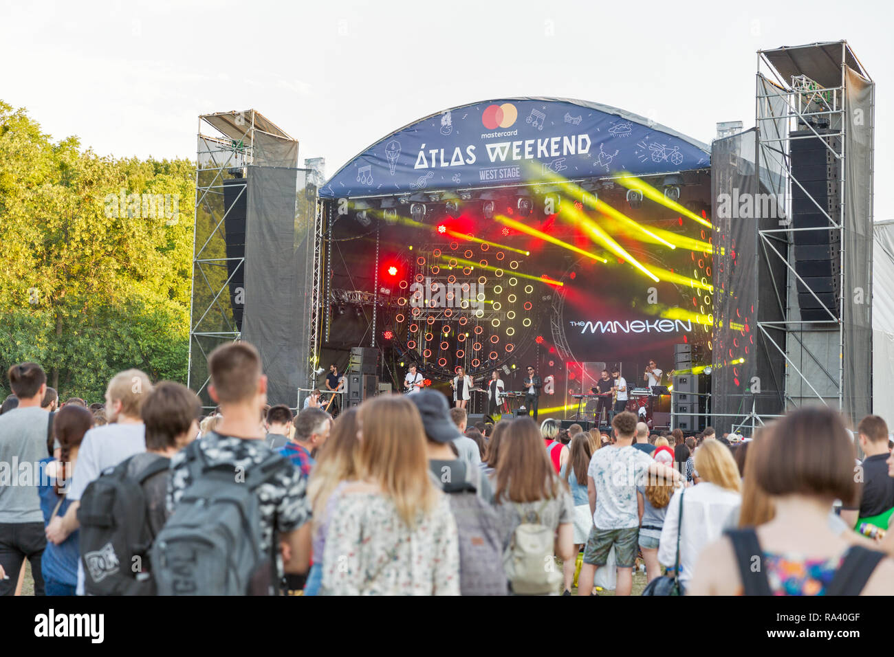KIEV, UKRAINE - JULY 06, 2018: Young fans crowd enjoy The Maneken ...