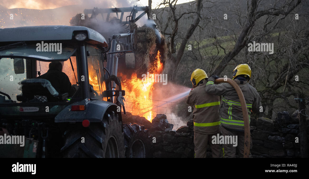Fire crew attending a barn fire, Cumbria, UK Stock Photo - Alamy