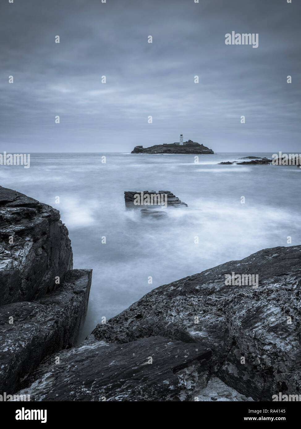 Godrevy lighthouse on a grey stormy day Stock Photo - Alamy