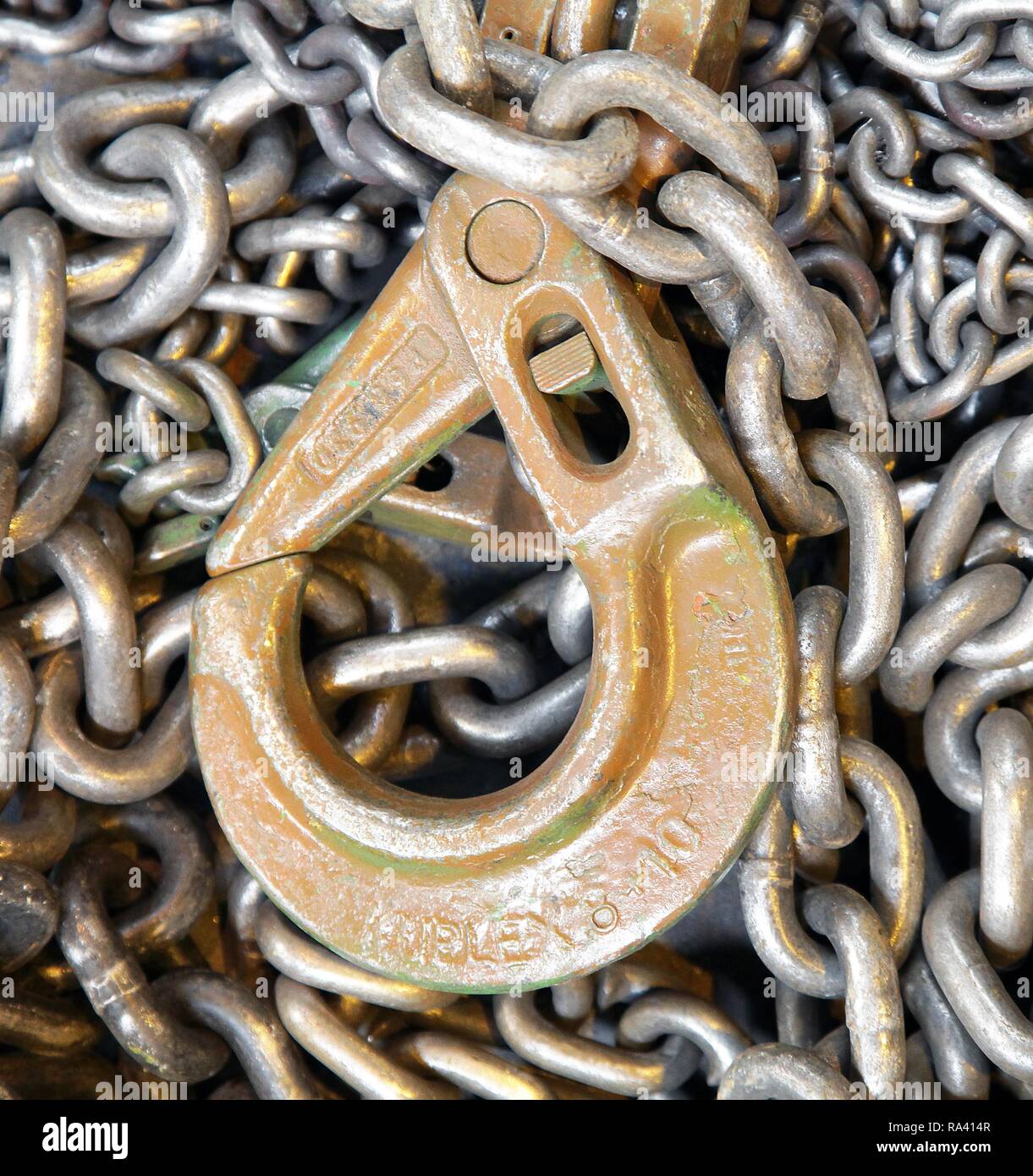 Industrial chains and hook.endless sling.strap cable Stock Photo - Alamy