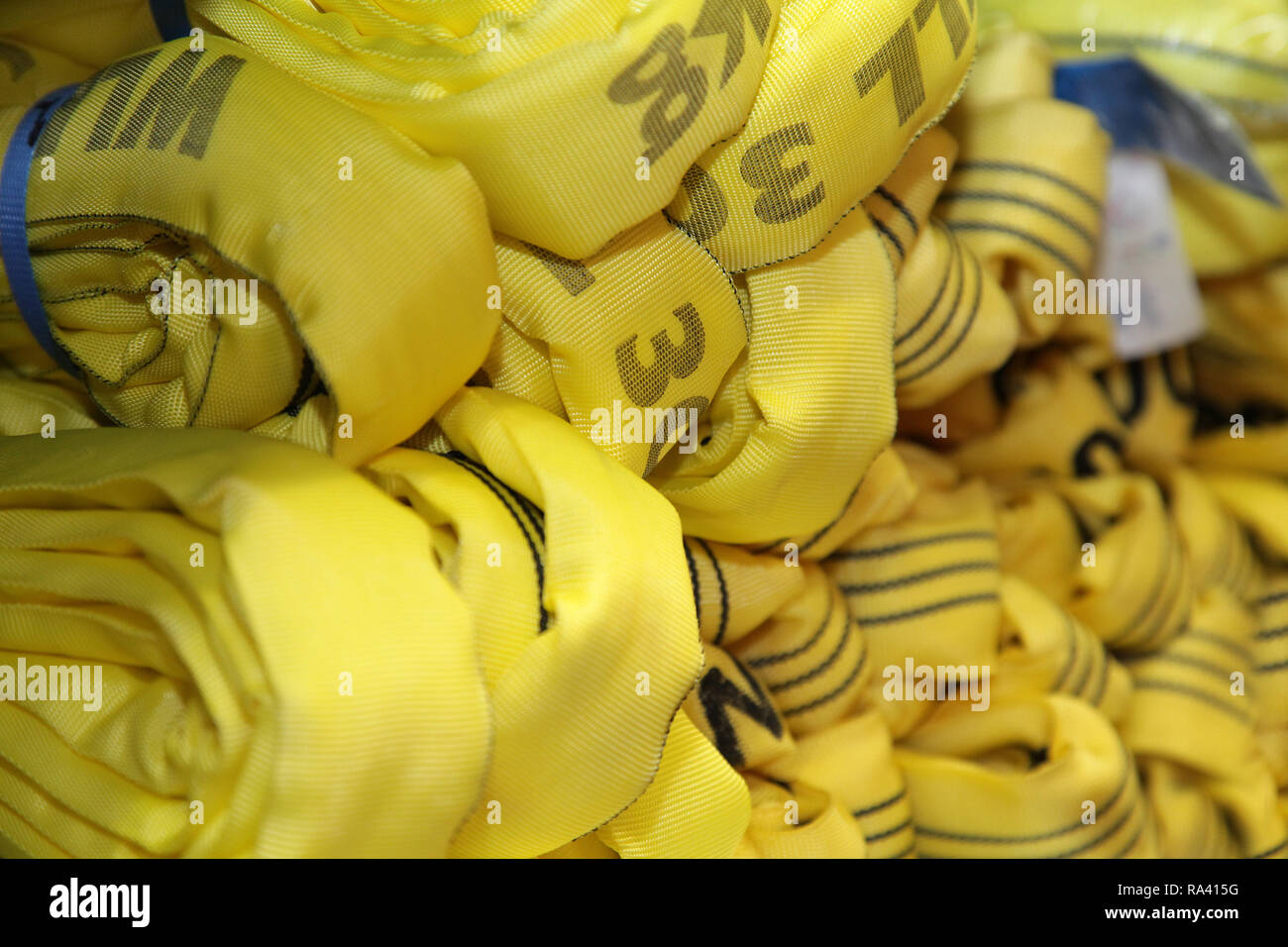 Industrial chains and hook.endless sling.strap cable Stock Photo - Alamy