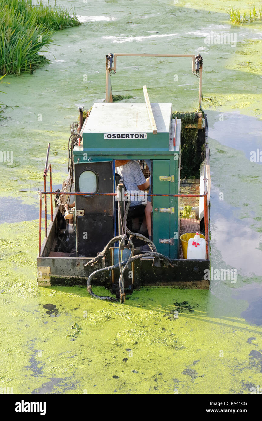 Canal and river trust dredger clearing the Grantham canal at ...
