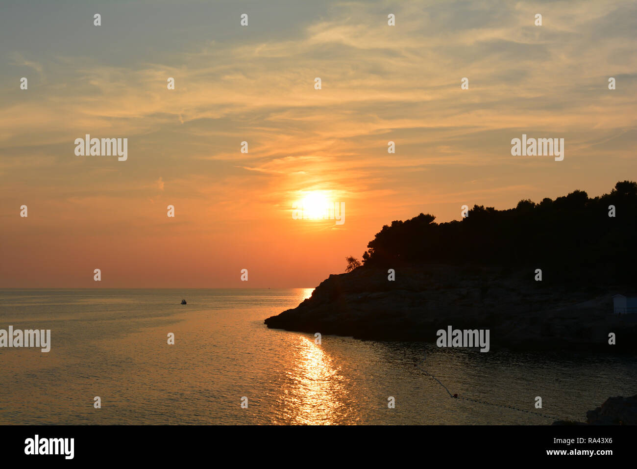 Sunset on the Croatian coast Stock Photo - Alamy