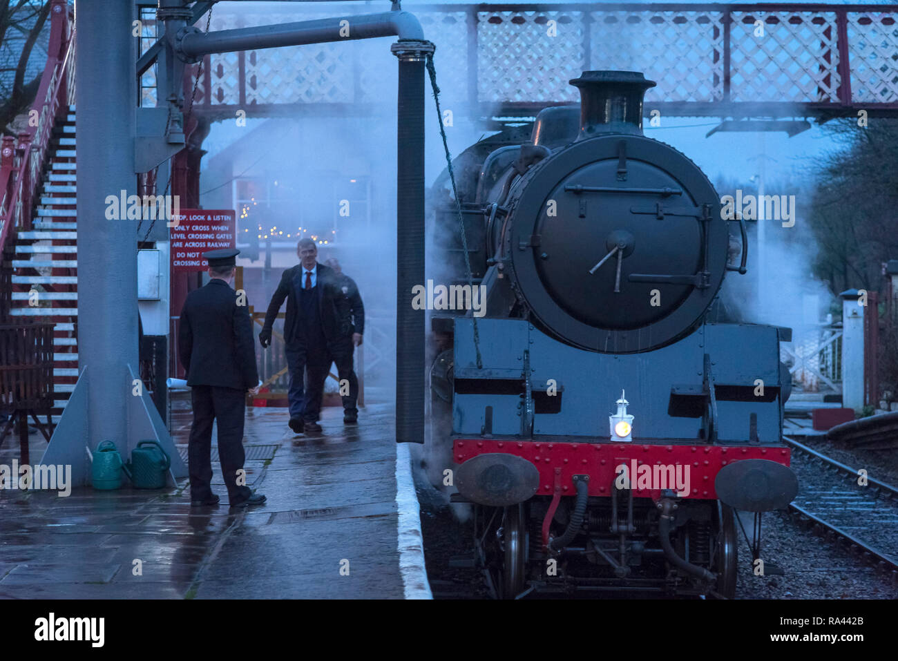 Heritage steam tank engine locomotive. Winter evening at Ramsbottom ...