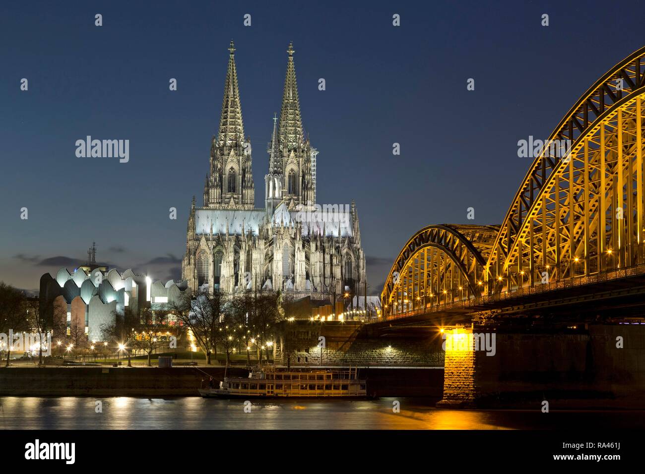 Cologne Cathedral and Philharmonic Hall with Hohenzollern Bridge, night ...