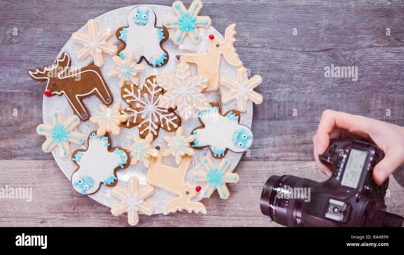 Flat lay. Food photographer photographing Christmas cookies with ...
