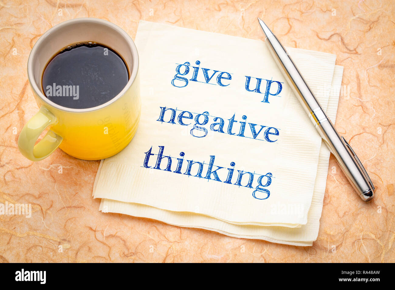 give up negative thinking - inspirational handwriting on napkin with a ...