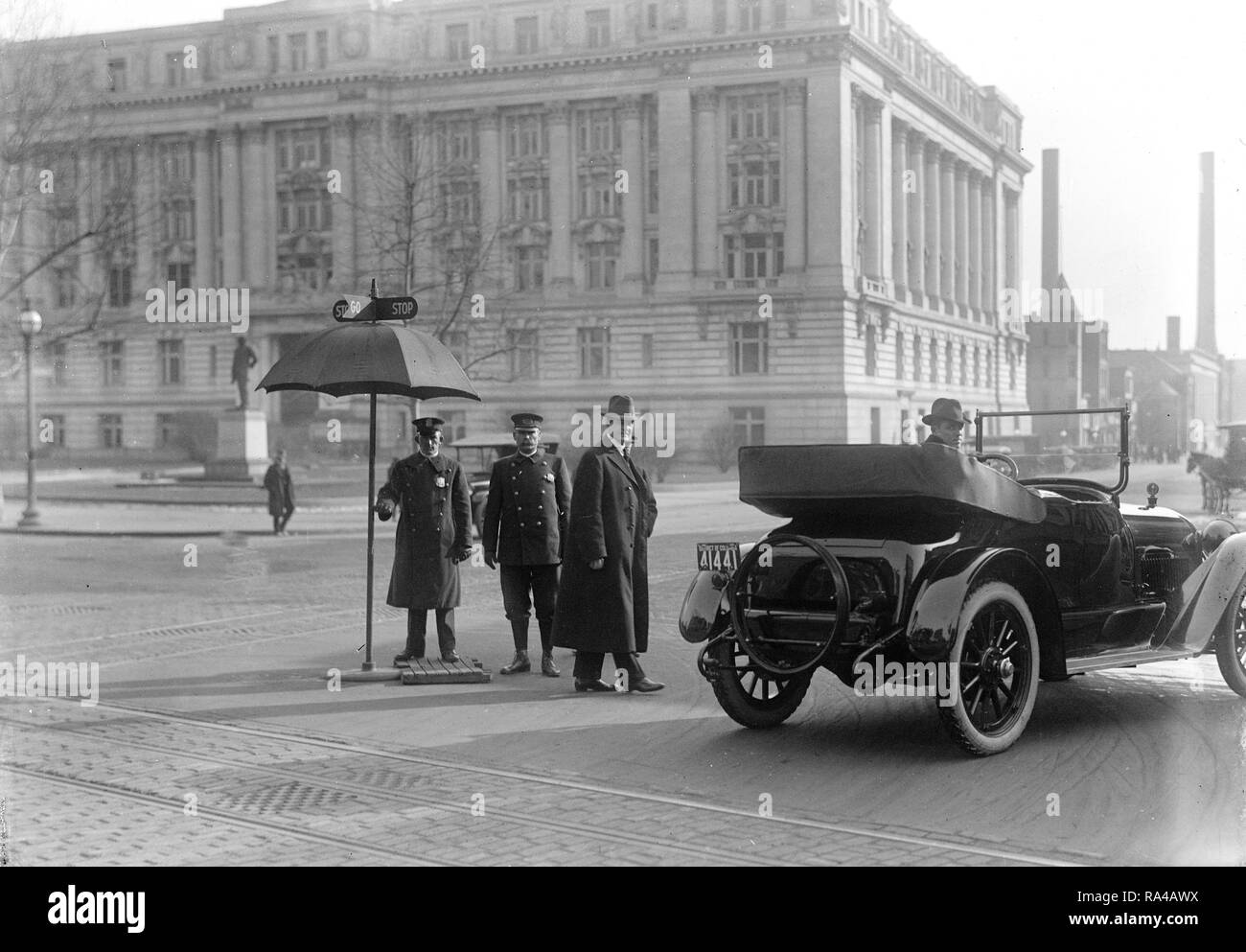 Washington D.C. Street scene with early stop and go signs ca. 1913 ...