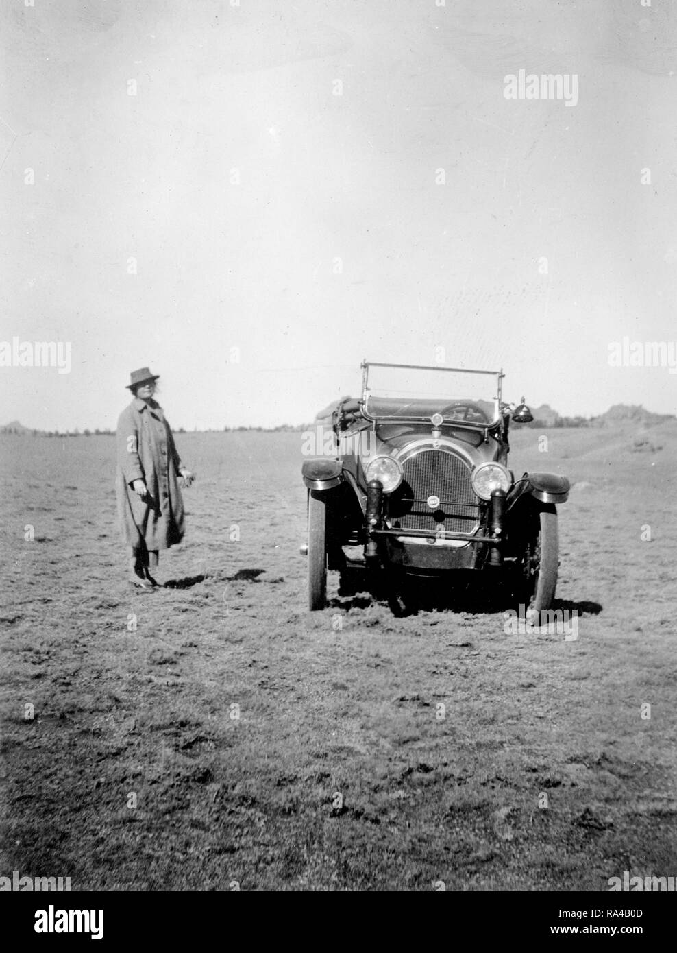 Woman next car in Black and White Stock Photos & Images - Alamy