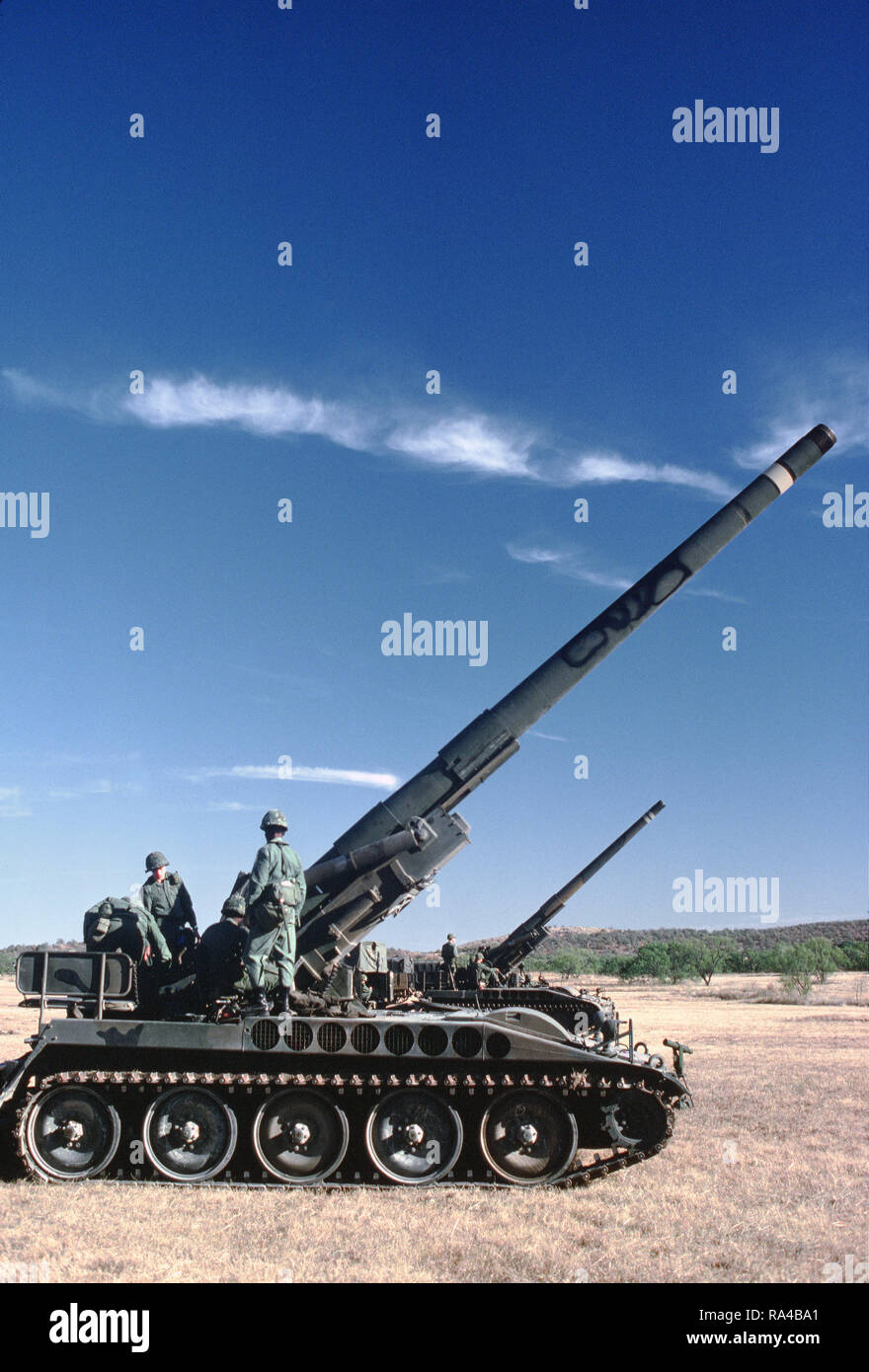1975 - Ammunition is loaded into M107 175 mm self-propelled howitzers ...