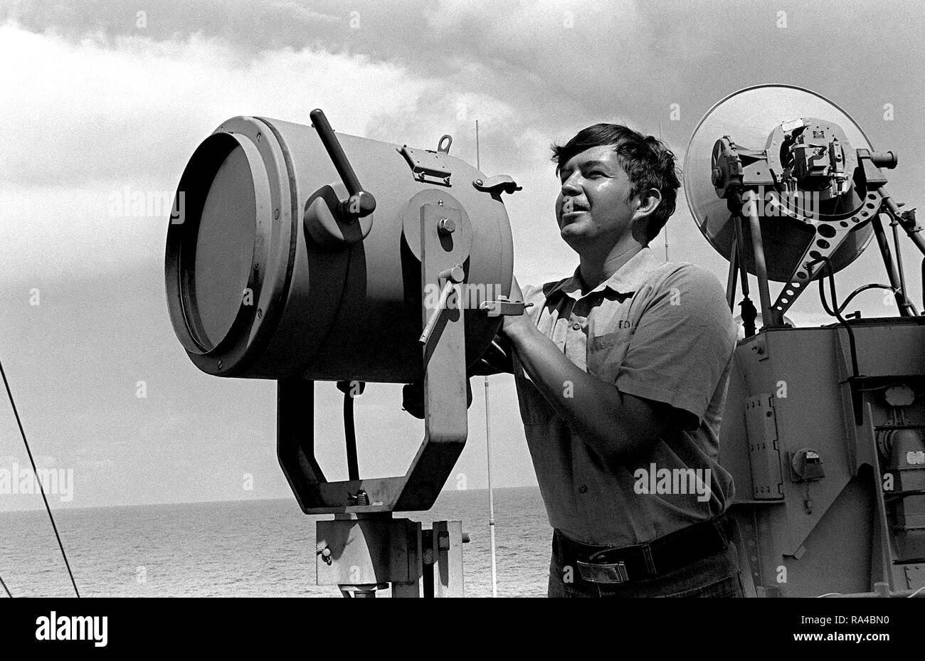 1979 - A signalman aboard the guided missile destroyer USS DEWEY (DDG ...
