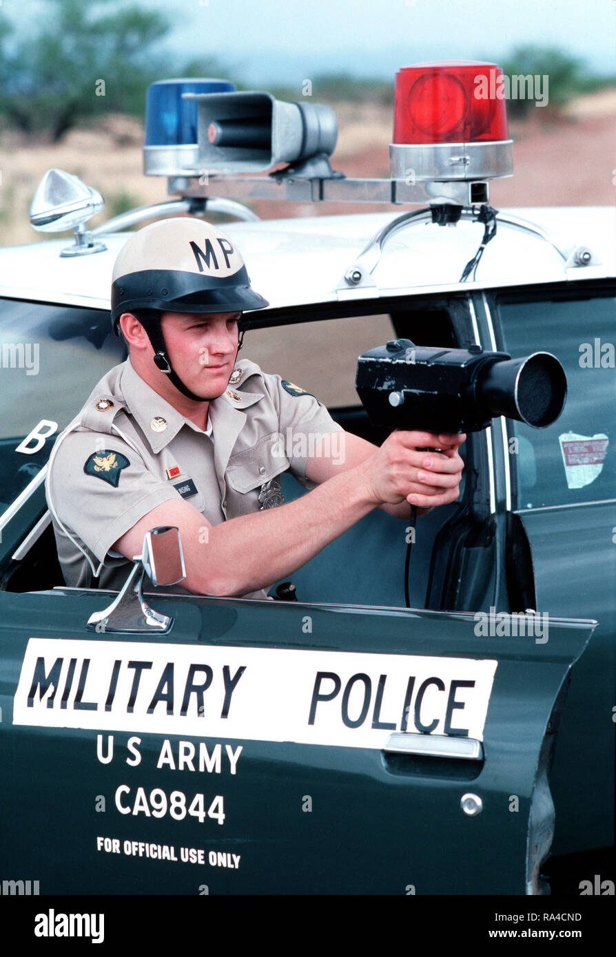 1976 - A US Army military policeman uses radar speed detection ...