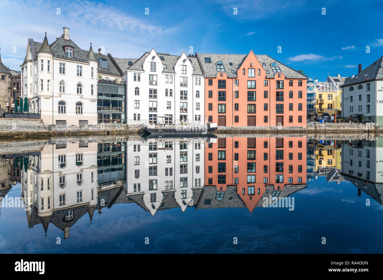 Reflections of buildings in the Art Nouveau Town of Ålesund, Norway ...