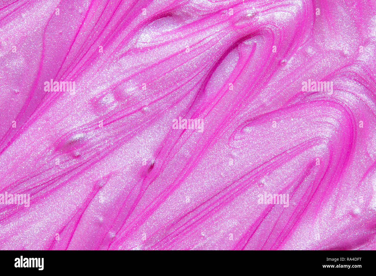 Abstract background of pink and silver metallic liquid paint swirls ...