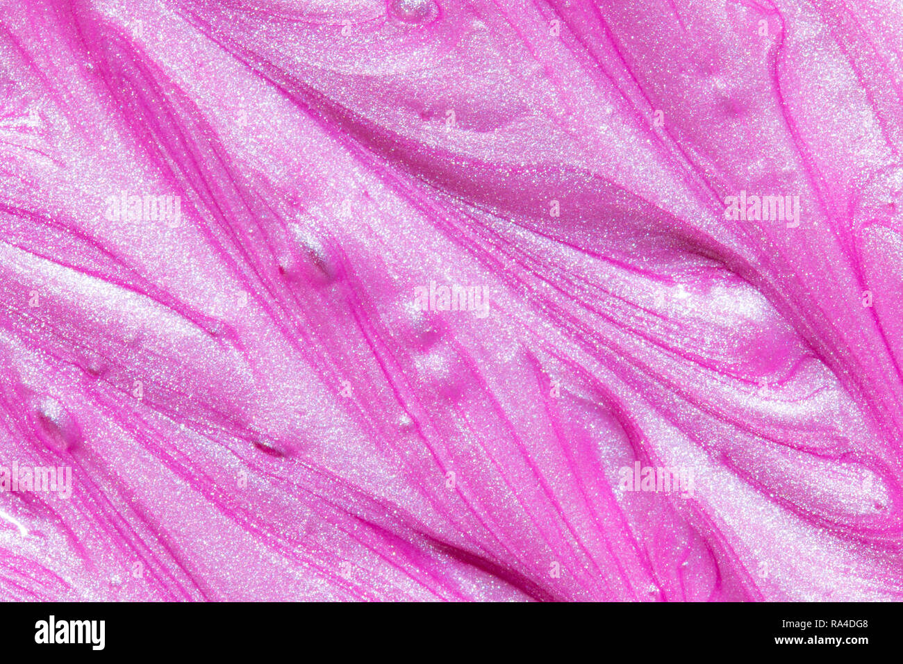 Abstract background of pink and silver metallic liquid paint swirls ...